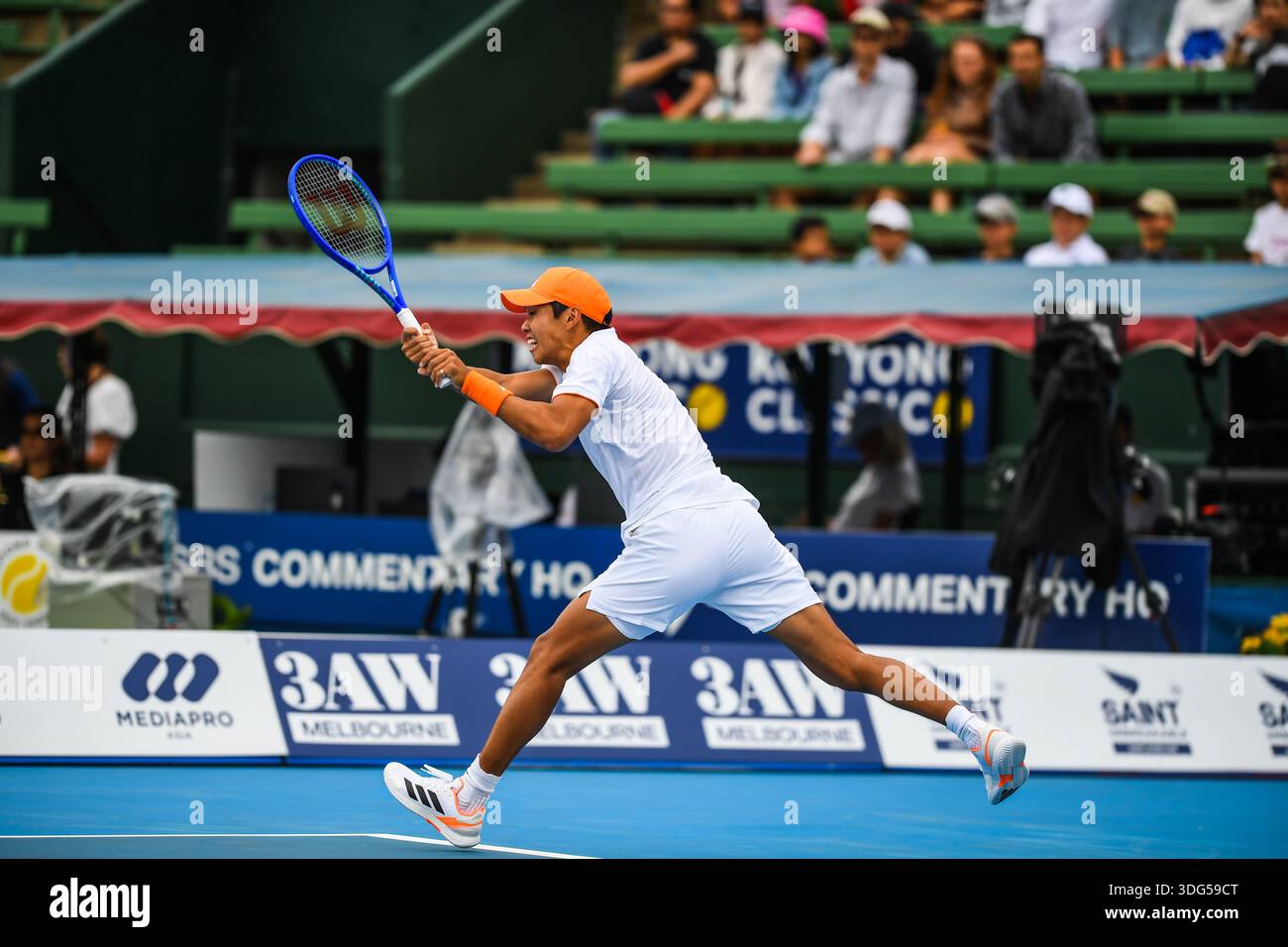 Learner Tien (USA) is seen in action during the tennis match with Marin ...