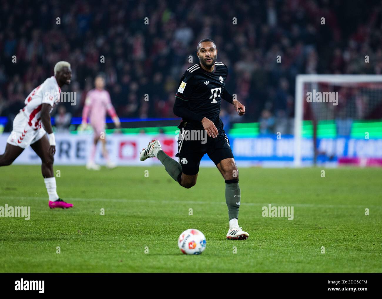 Köln, RheinEnergieStadion, 14.01.2026: Jonathan Tah of Muenchen runs ...