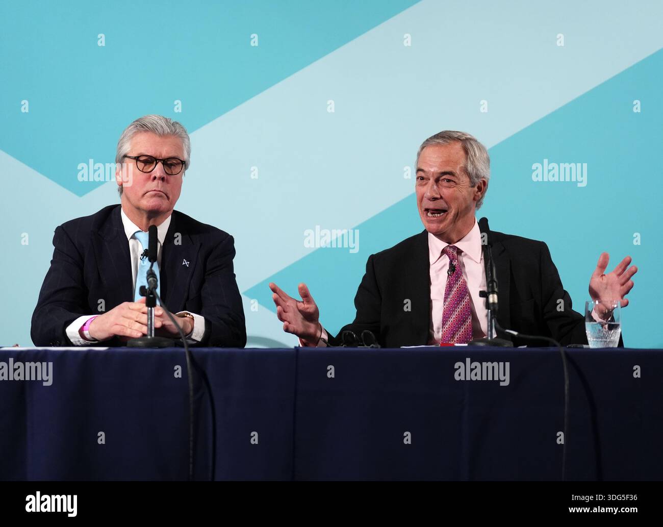 Reform UK leader Nigel Farage with Malcolm Offord (left) during a press ...