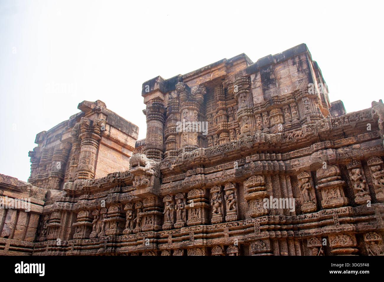 Intricately carved sandstone walls of Konark Sun Temple rise ...