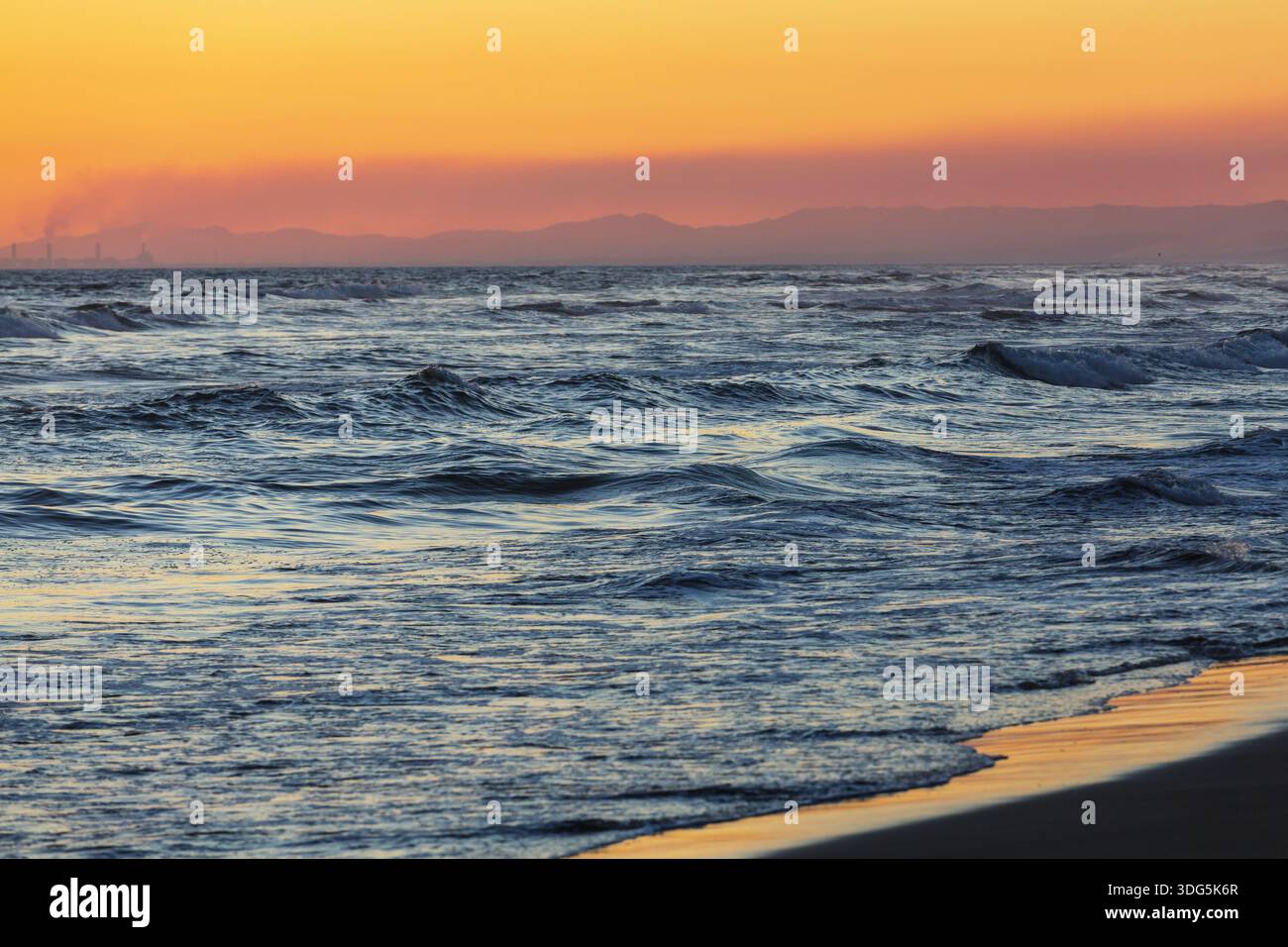 Ocean beach at sunset for natural background Stock Photo - Alamy
