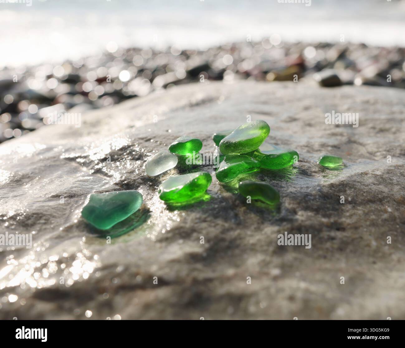 Glass sea pebbles of different colours on shore, beach. Nature and ...