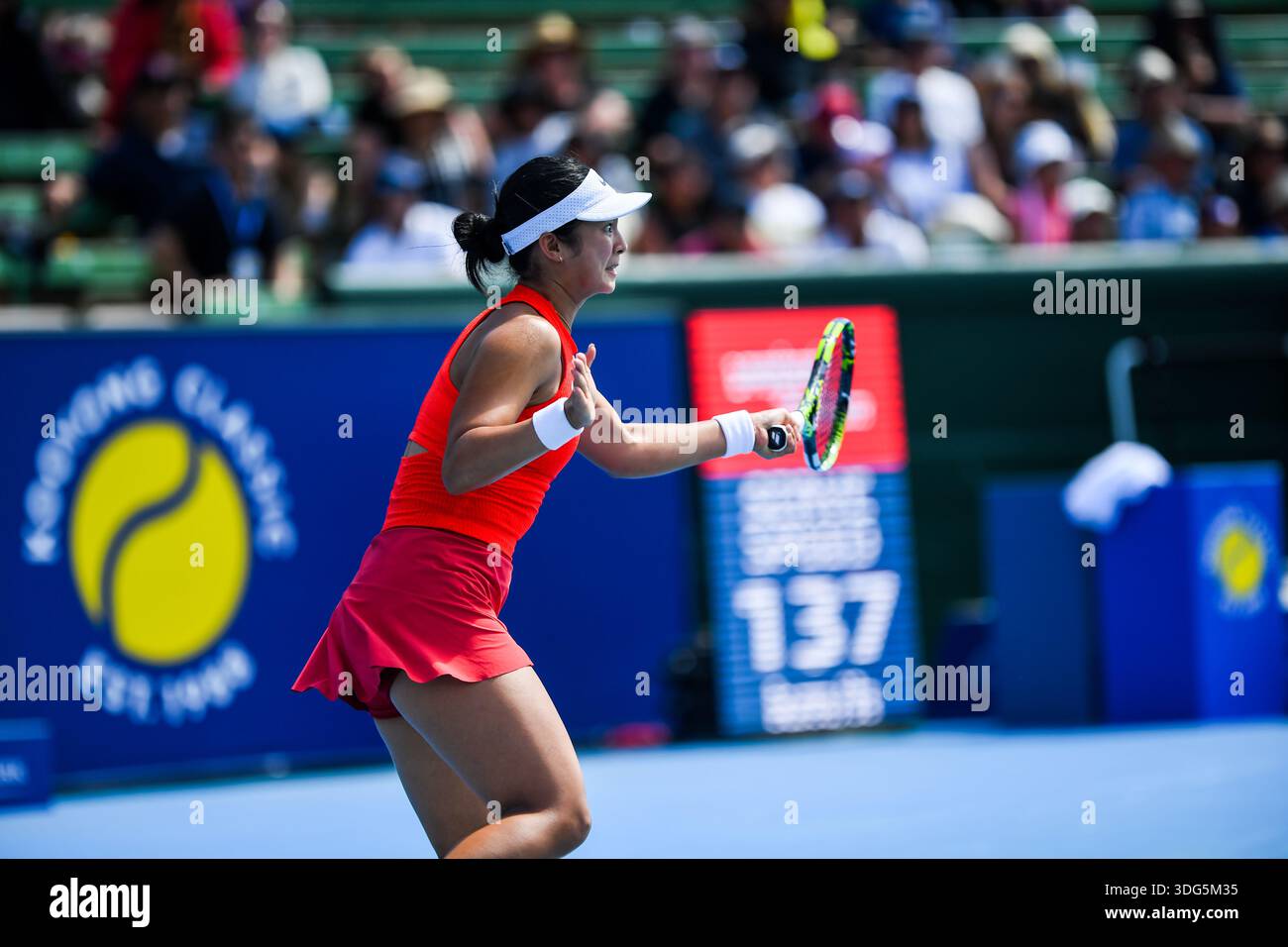 is seen in action during the tennis match with at Kooyong Classic ...