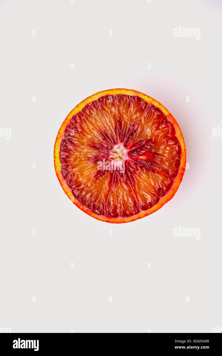 Red blood orange and orange slice, isolated on white background. Close ...