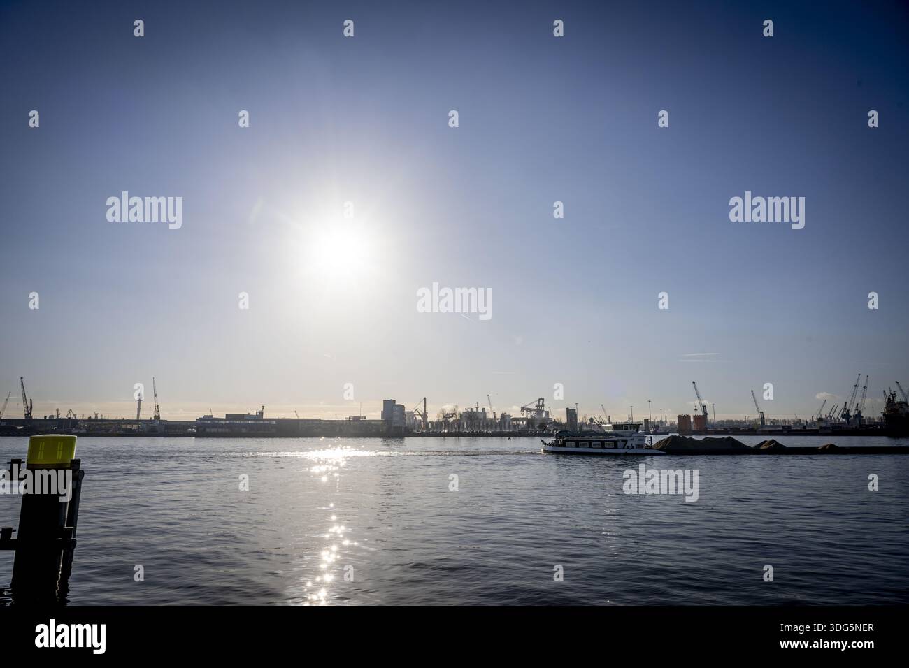 ROTTERDAM - River Maas with an inland vessel in the center of Rotterdam ...