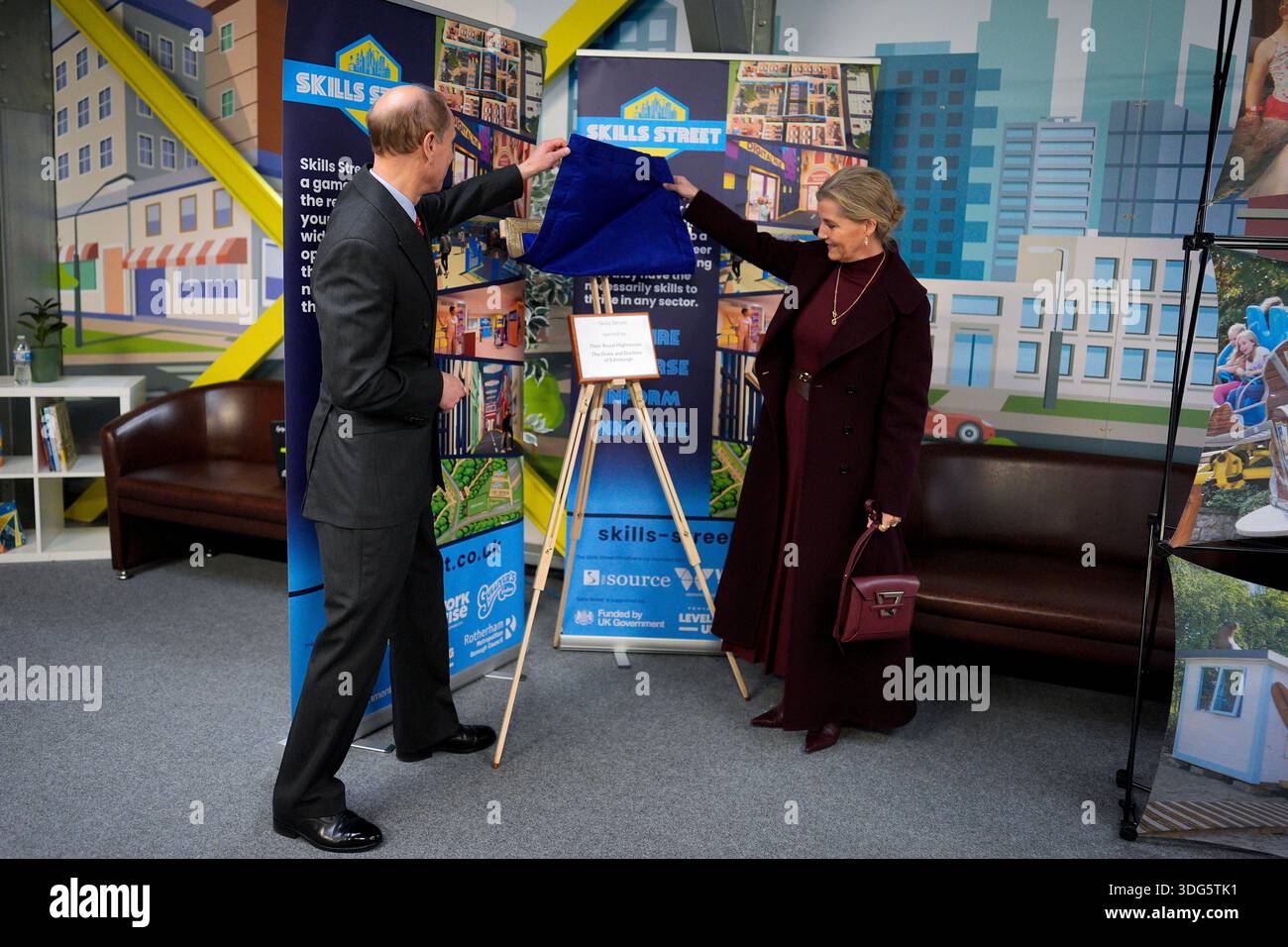 The Duke and Duchess of Edinburgh unveil a plaque during a visit to ...