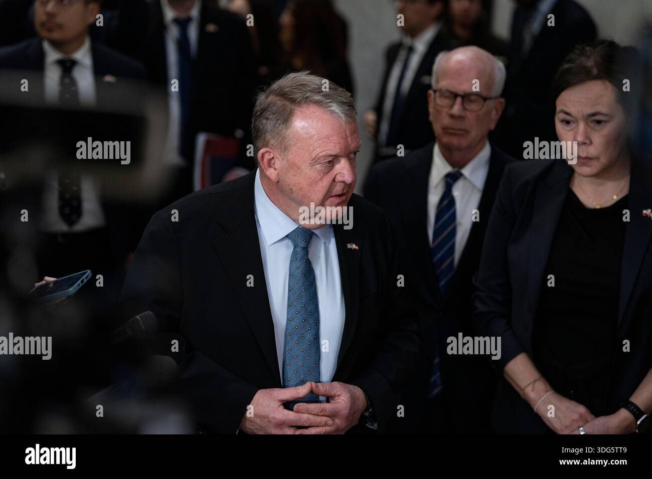 Danish Foreign Minister Lars Løkke Rasmussen speaks to reporters after ...