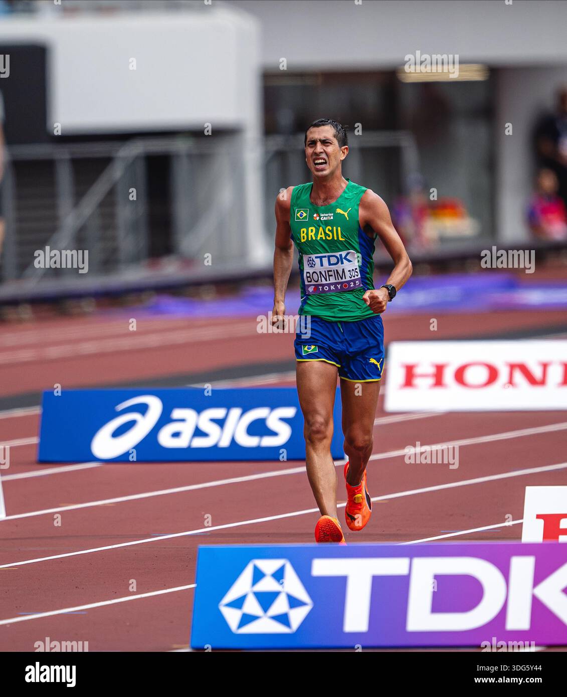 Caio Bonfim celebrating her victory with her country's flag at the 2025 ...