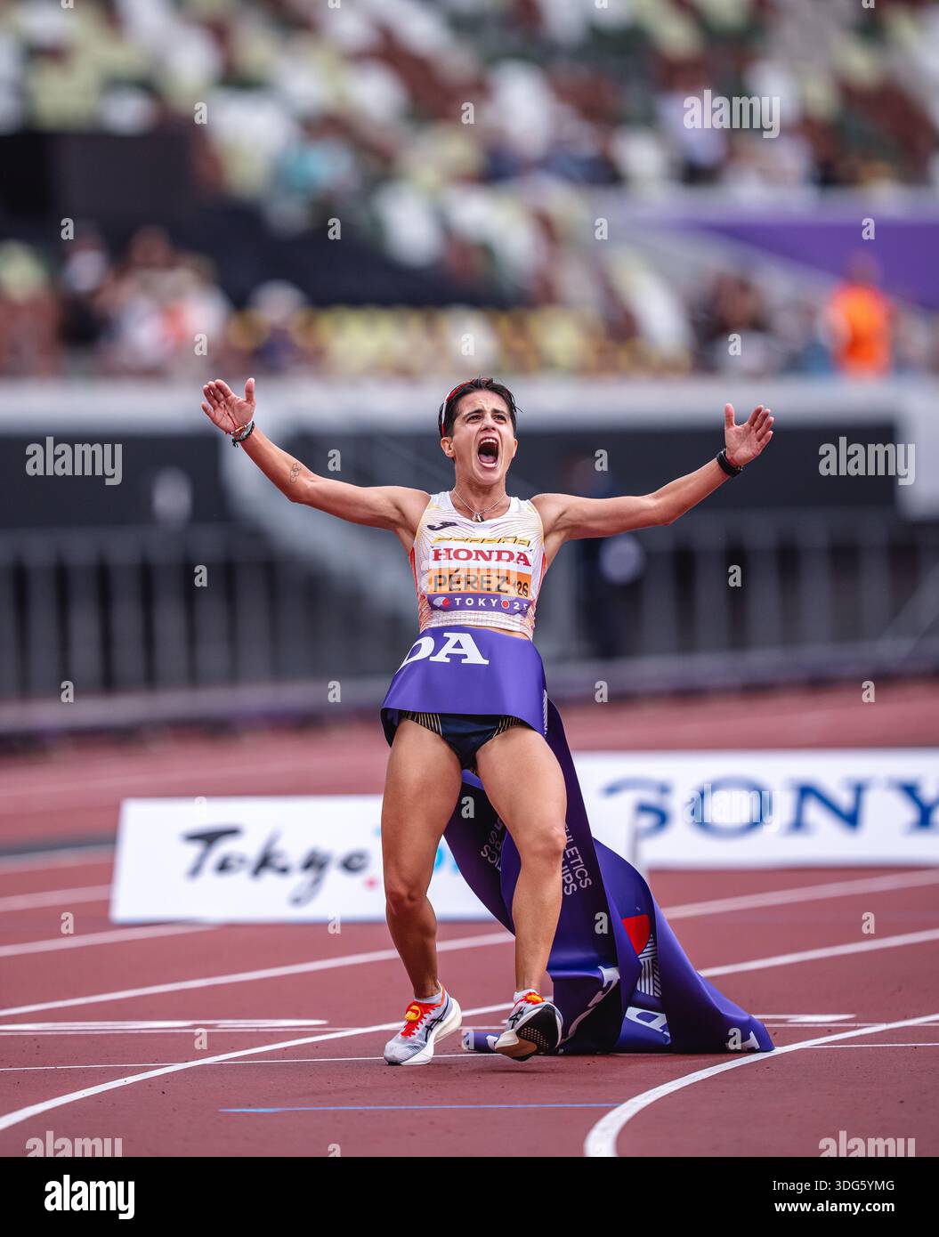 Maria Perez celebrating her victory with her country's flag at the 2025 ...