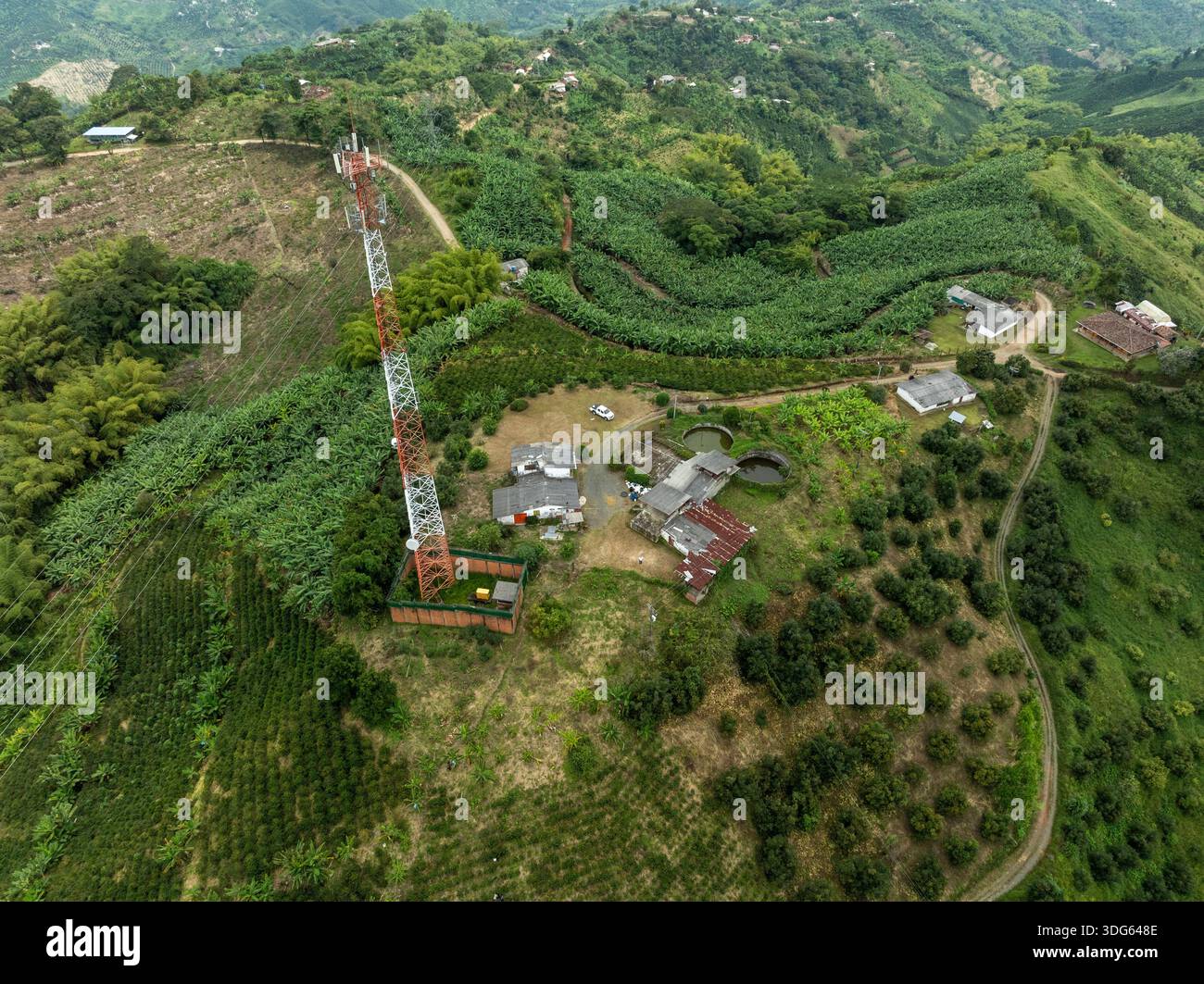 Aerial view of rural landscape with telecom tower and agricultural ...