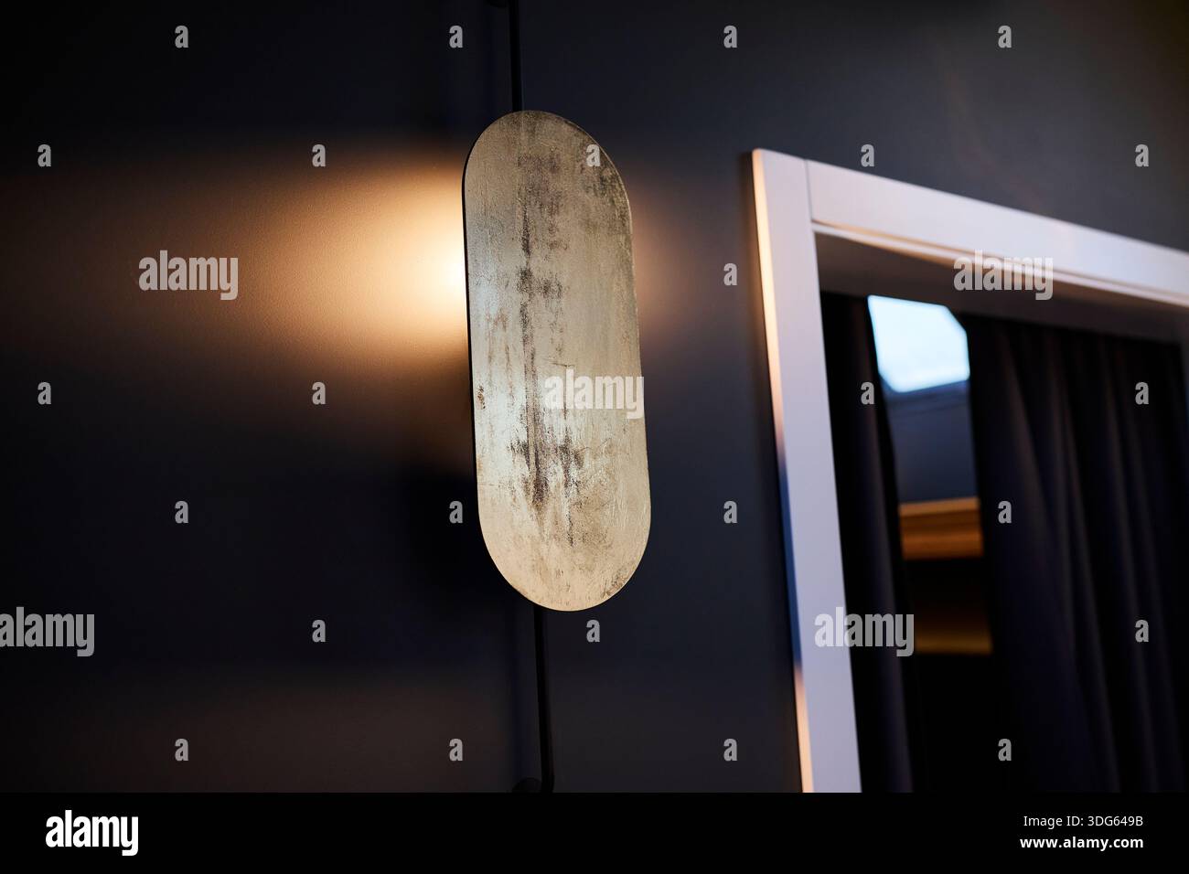 Wall Lamp in Dark Interior with Golden Design Stock Photo - Alamy