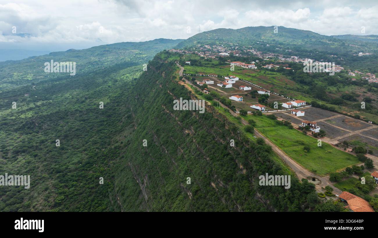 Scenic aerial view of lush green mountains with a winding cliffside ...