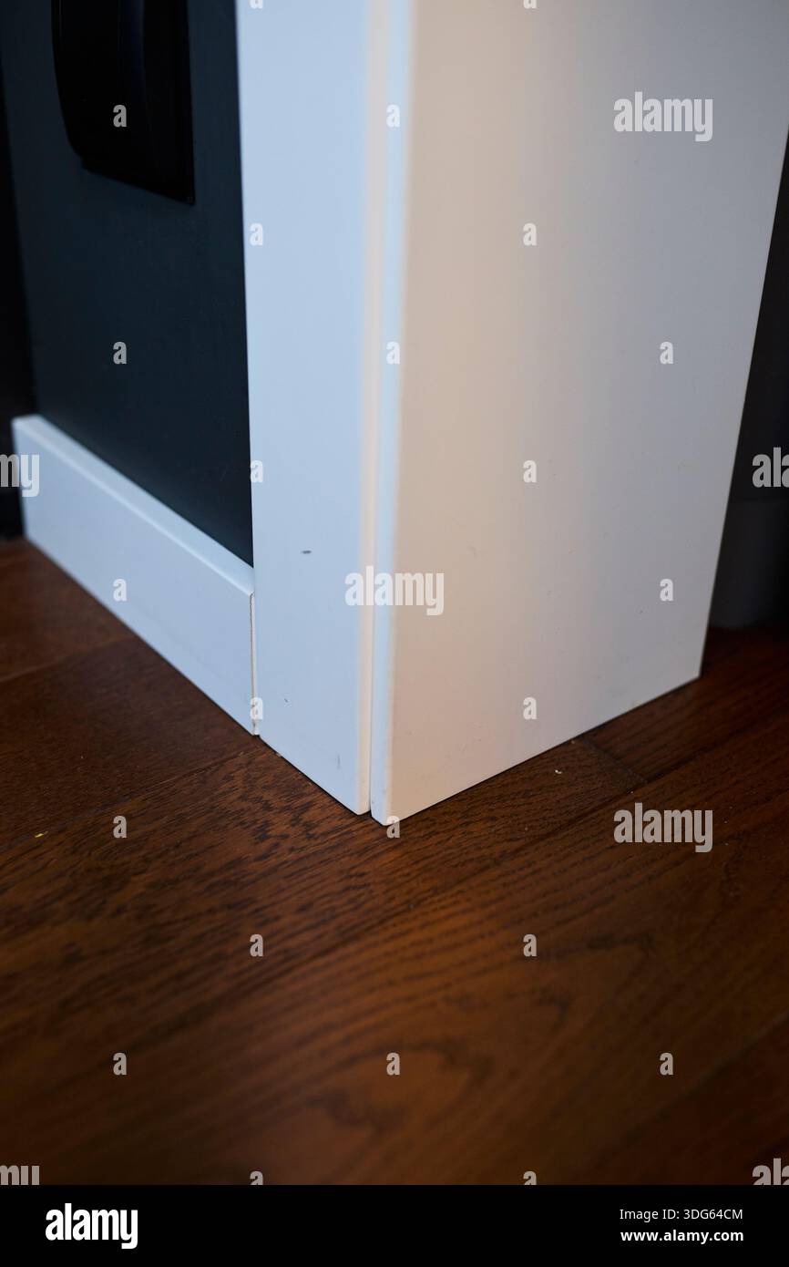 White Wooden Door Frame Against Dark Interior Background Stock Photo ...