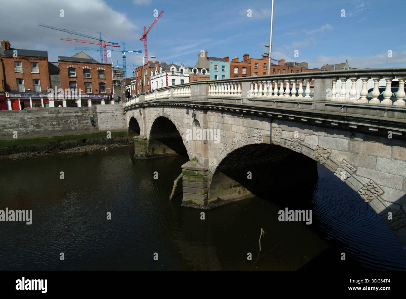 Mellowes Bridge, a stone built structure spanning the river Liffey ...