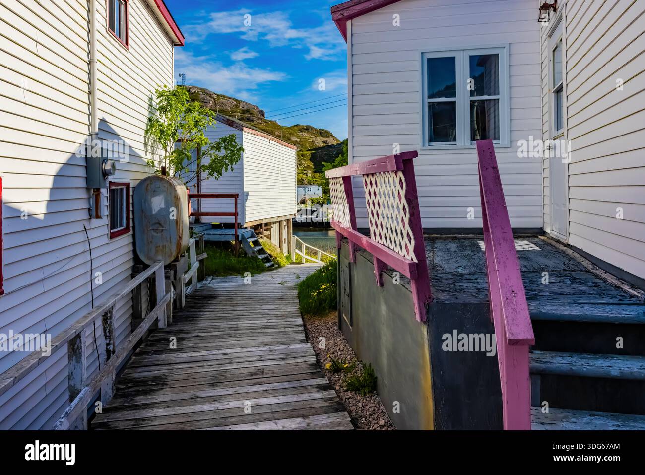 Houses and boardwalk in the tiny outport of McCallum, Newfoundland ...