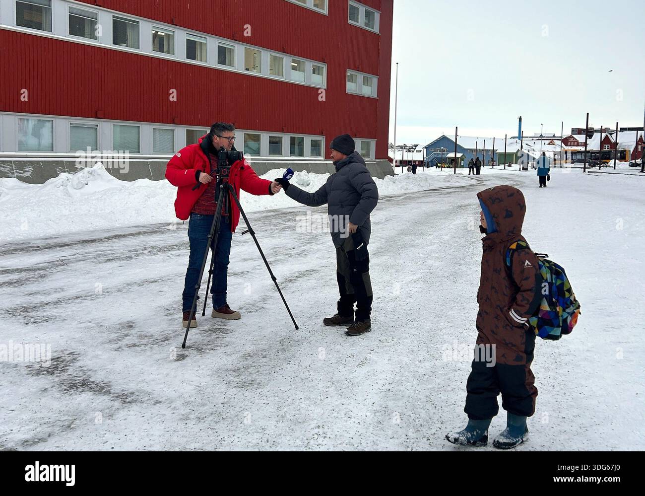 A journalist conducts an interview in Nuuk, Greenland, Thursday, Jan ...