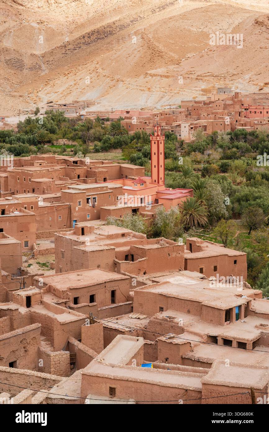 Aerial view of a traditional desert village with brick buildings and a ...