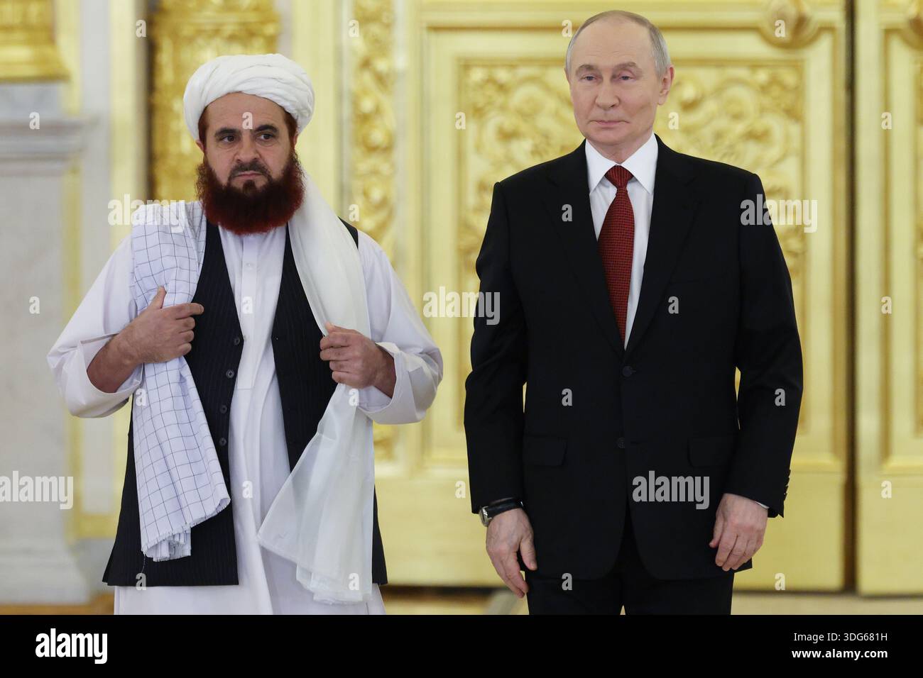 Russian President Vladimir Putin, right, and the Ambassador of the ...