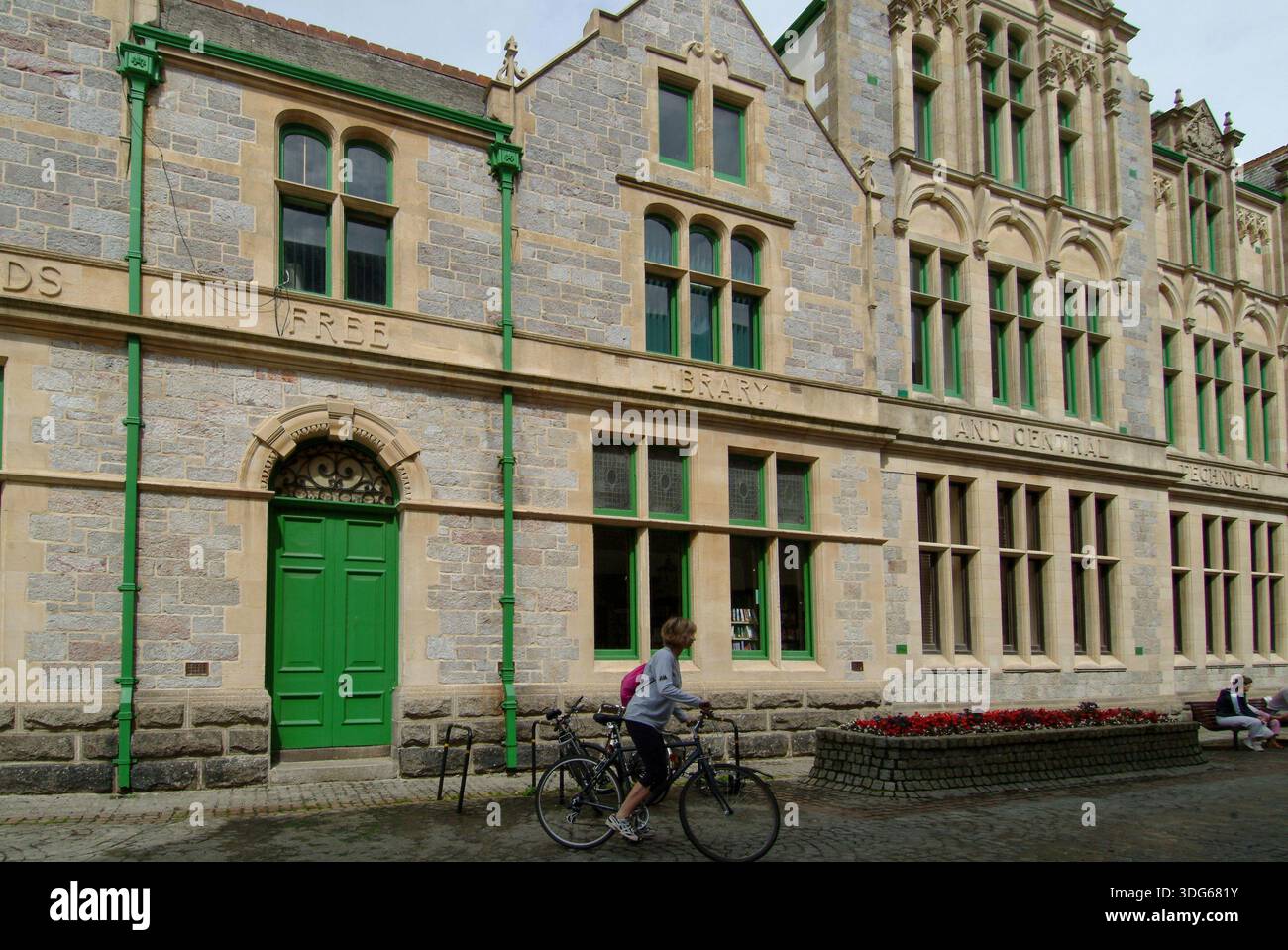 The imposing stone façade of the Passmore Edwards Library in a quiet ...
