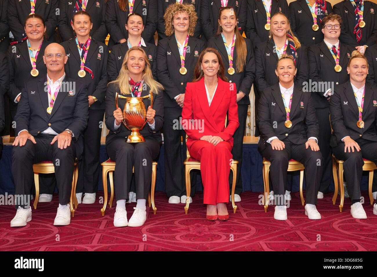 Britain's Kate, Princess of Wales, poses with members of the England ...