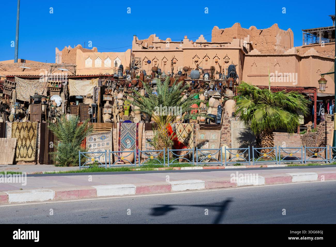 Moroccan market with traditional architecture and outdoor displays on a ...