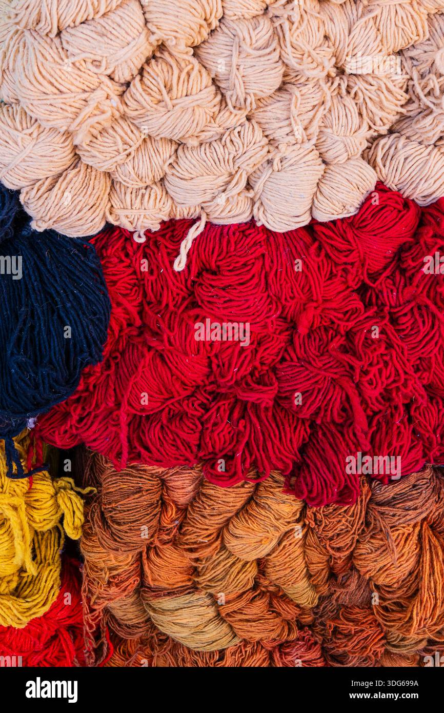Multicolored yarn bundles stacked in a vibrant, textured pattern. Rabat ...