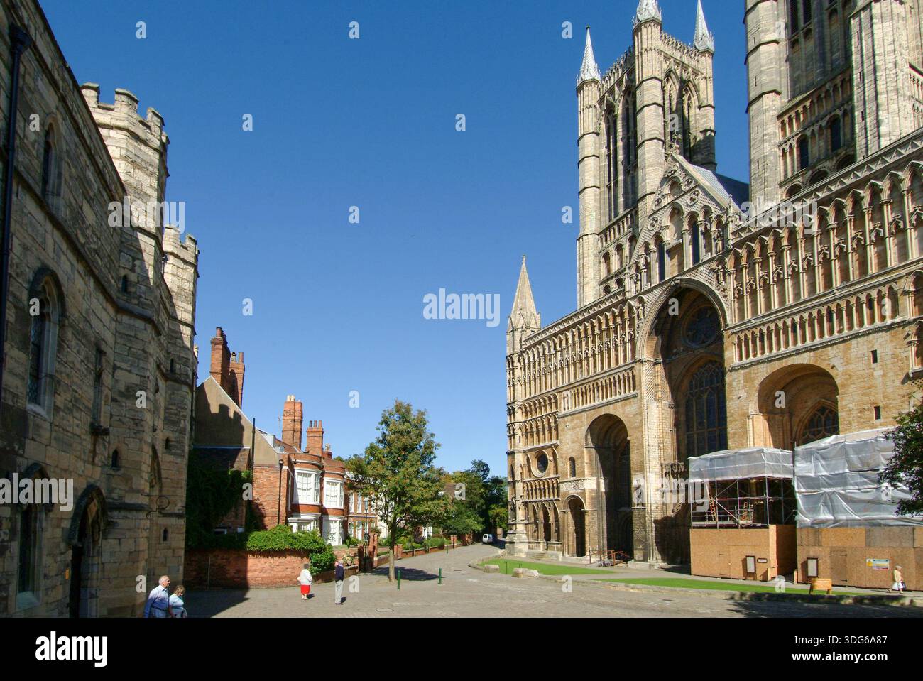 Exchequer Gate of Lincoln Cathedral framed by intricate Gothic ...