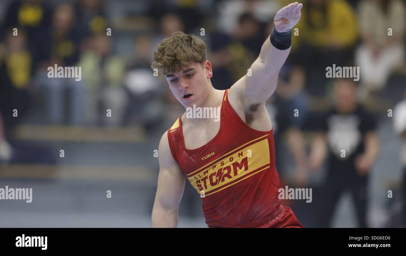 Simpson's Alex Campbell competes on the floor during an NCAA gymnastics ...
