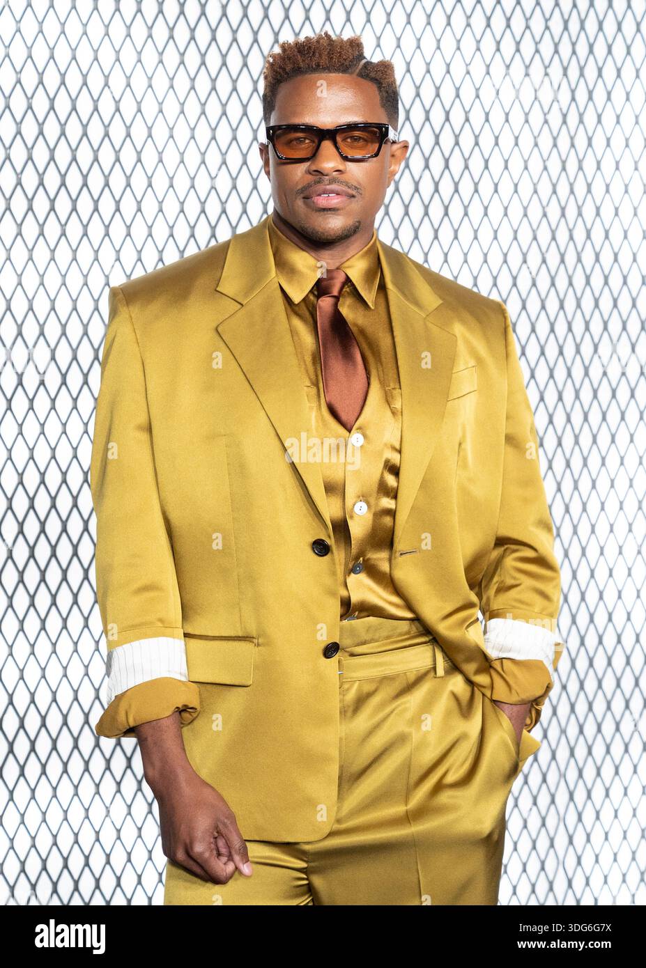 Jeremy Pope wearing suit by Yves Saint Laurent attends premiere of FX's ...