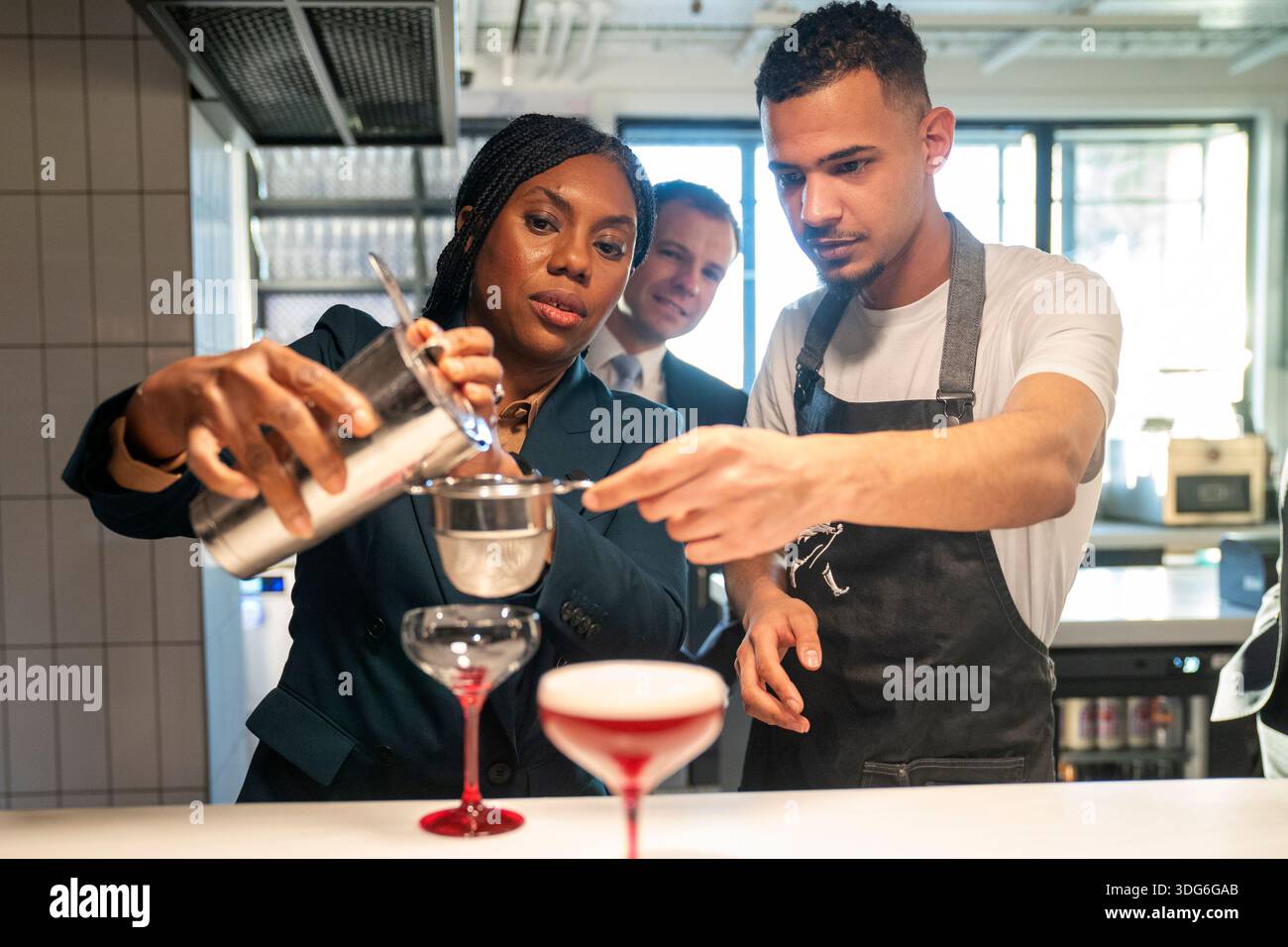 Conservative Party leader Kemi Badenoch makes a Ruby Sour cocktail ...