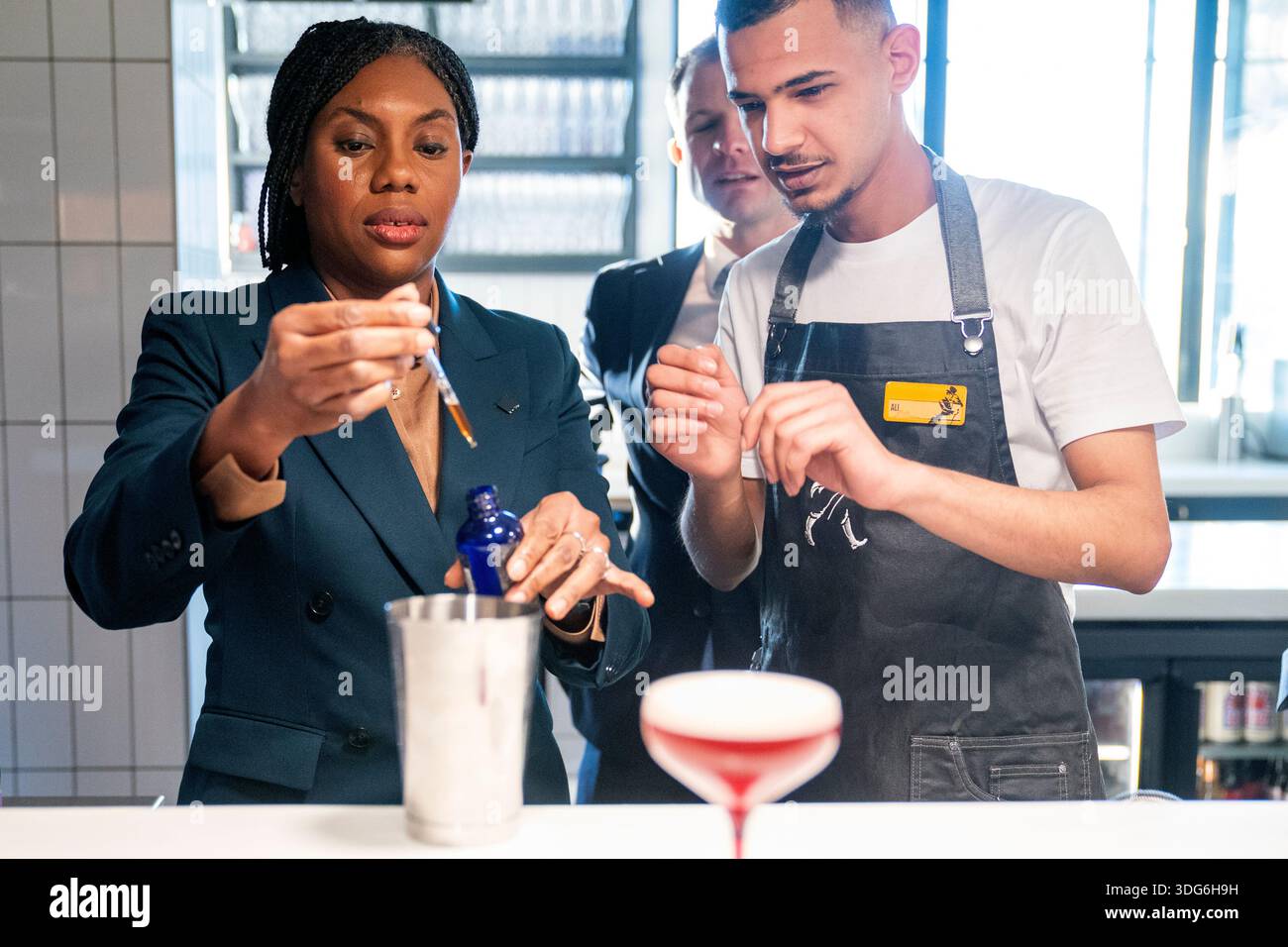 Conservative Party leader Kemi Badenoch makes a Ruby Sour cocktail ...