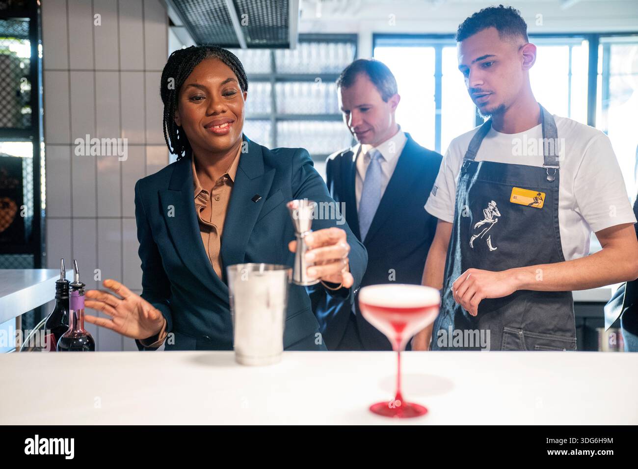 Conservative Party leader Kemi Badenoch makes a Ruby Sour cocktail ...