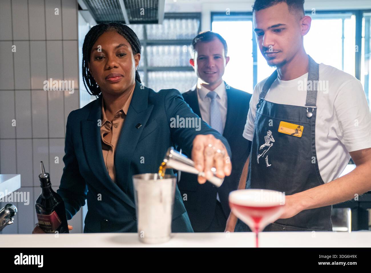 Conservative Party leader Kemi Badenoch makes a Ruby Sour cocktail ...