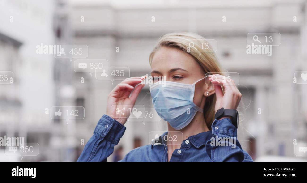 Adjusting woman touching mask hi-res stock photography and images - Alamy