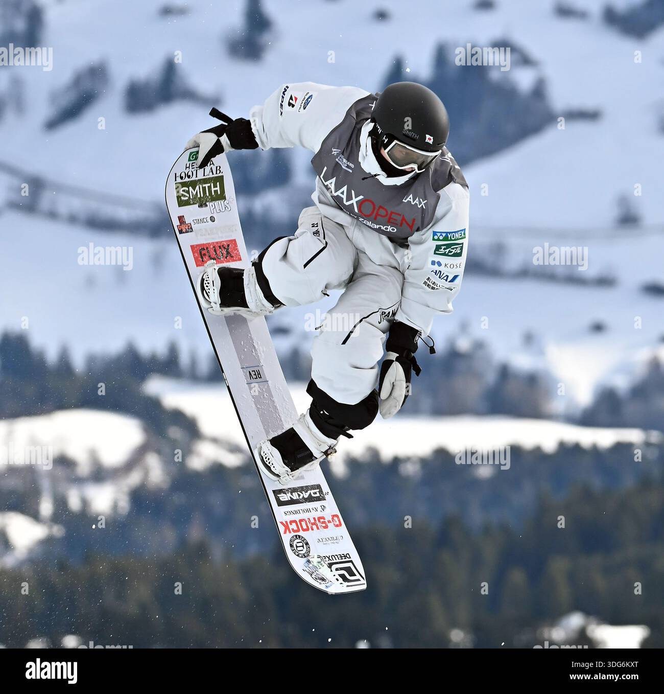 Yuto TOTSUKA of Japan competes during run 1 of the men's snowboard ...