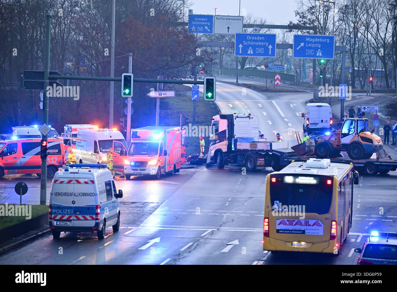 15 January 2026, Berlin: Rescue workers stand on the corner of ...