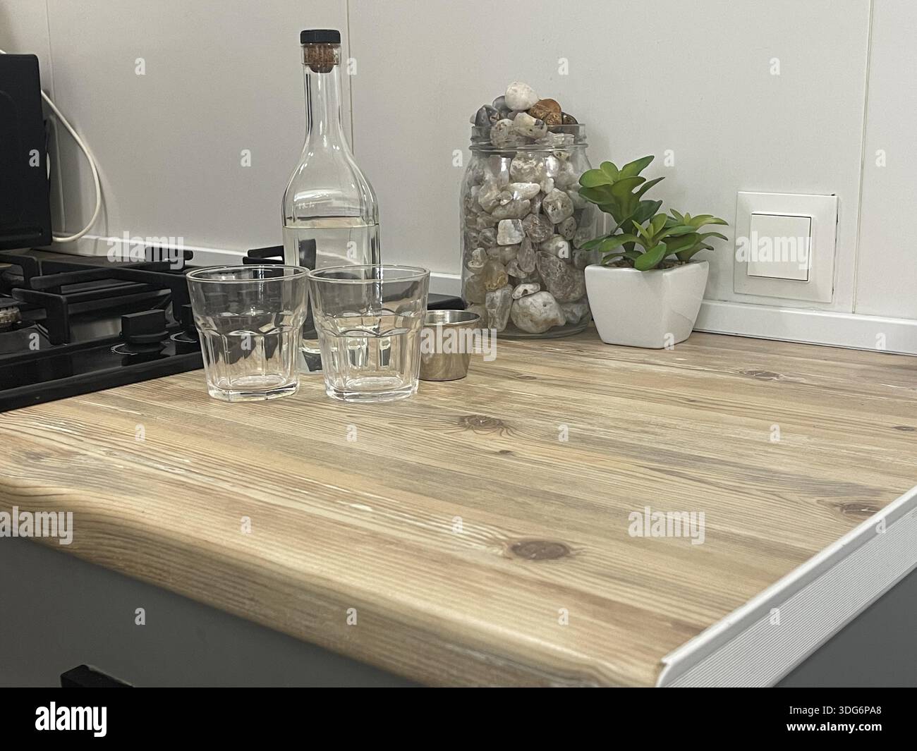 vodka with glasses on the holiday table Stock Photo - Alamy