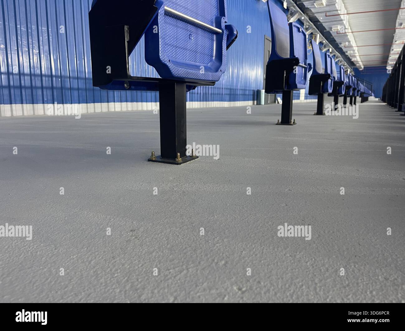 benches, stairs and an empty stadium for a sporting event Stock Photo ...