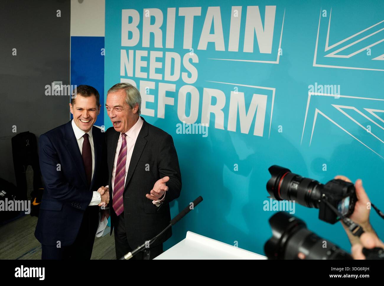 Robert Jenrick with Reform UK leader Nigel Farage at a Reform UK press ...