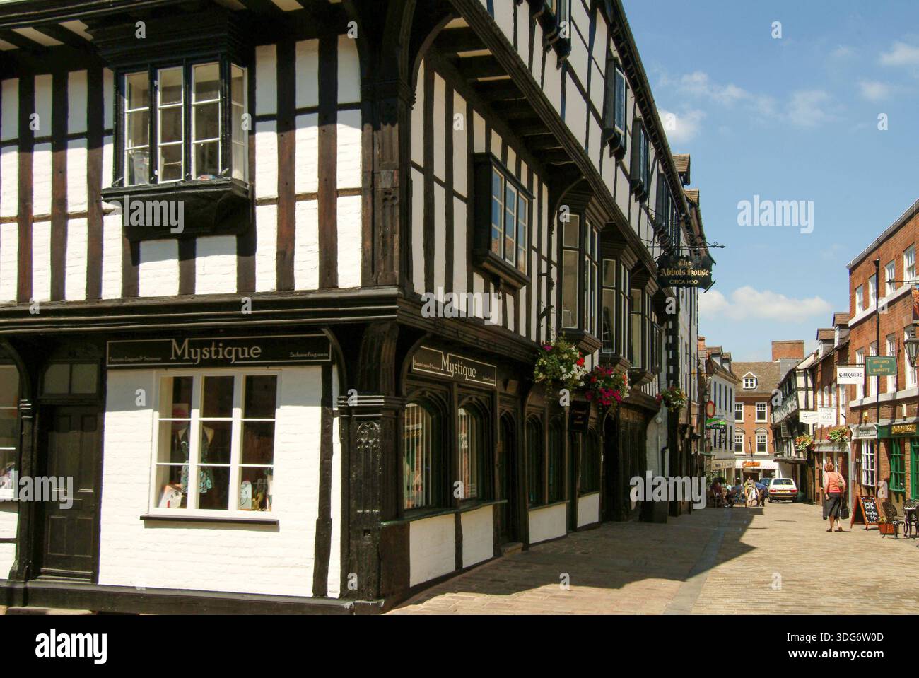 A half-timbered facade framing a historic marketplace along Butcher Row ...