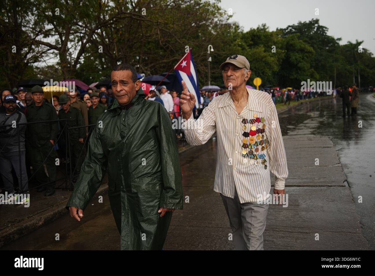 Alexis Tamayo, veteran of the Cuban Revolutionary Armed Forces, walks ...