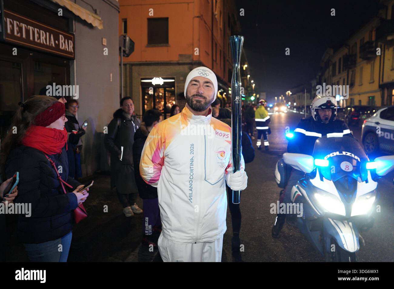 The Olympic flame arrives in Pavia, led by torchbearer Mauro Nespoli ...