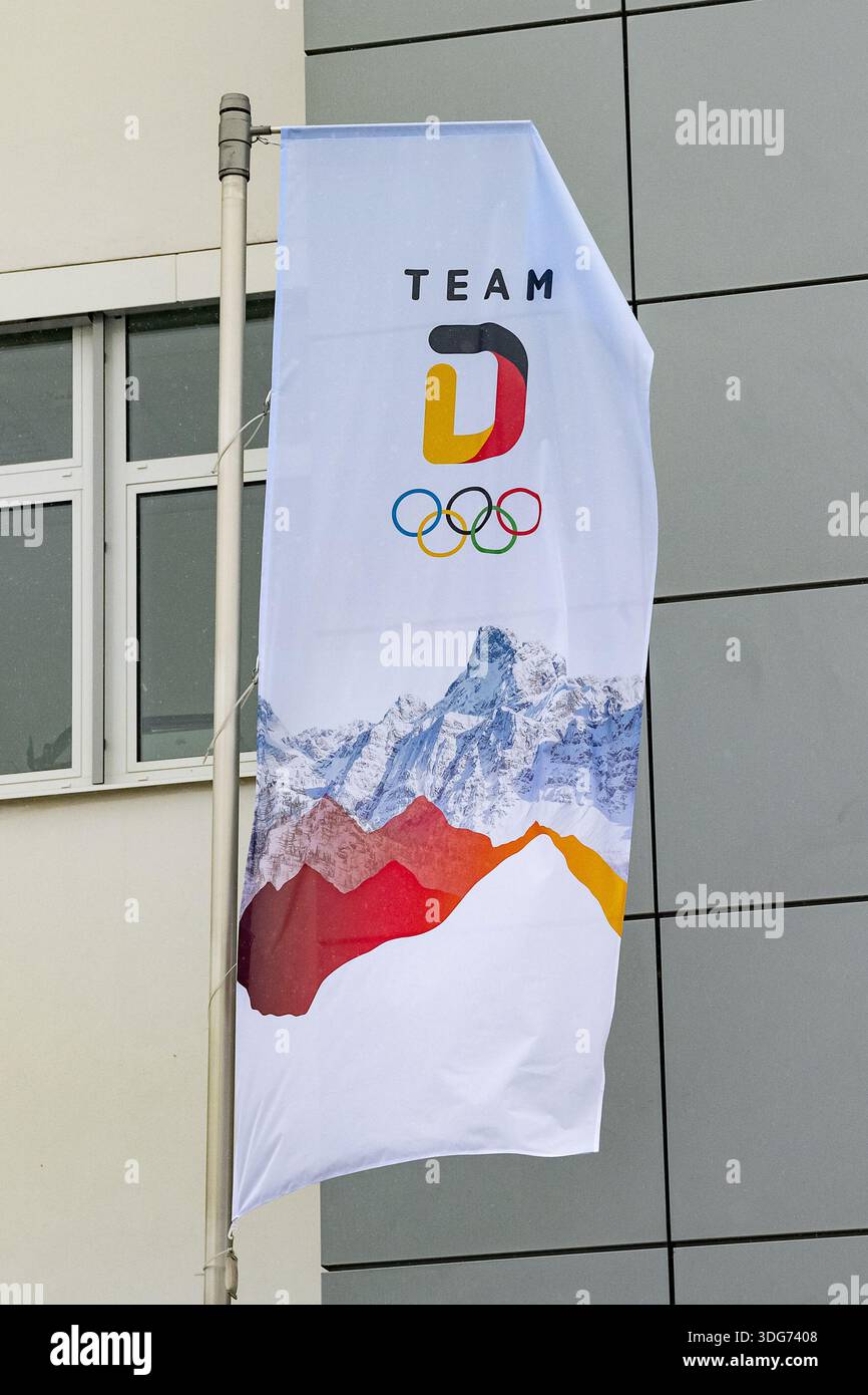 Flag in front of the MTC with Team Germany and the Olympic rings GER ...