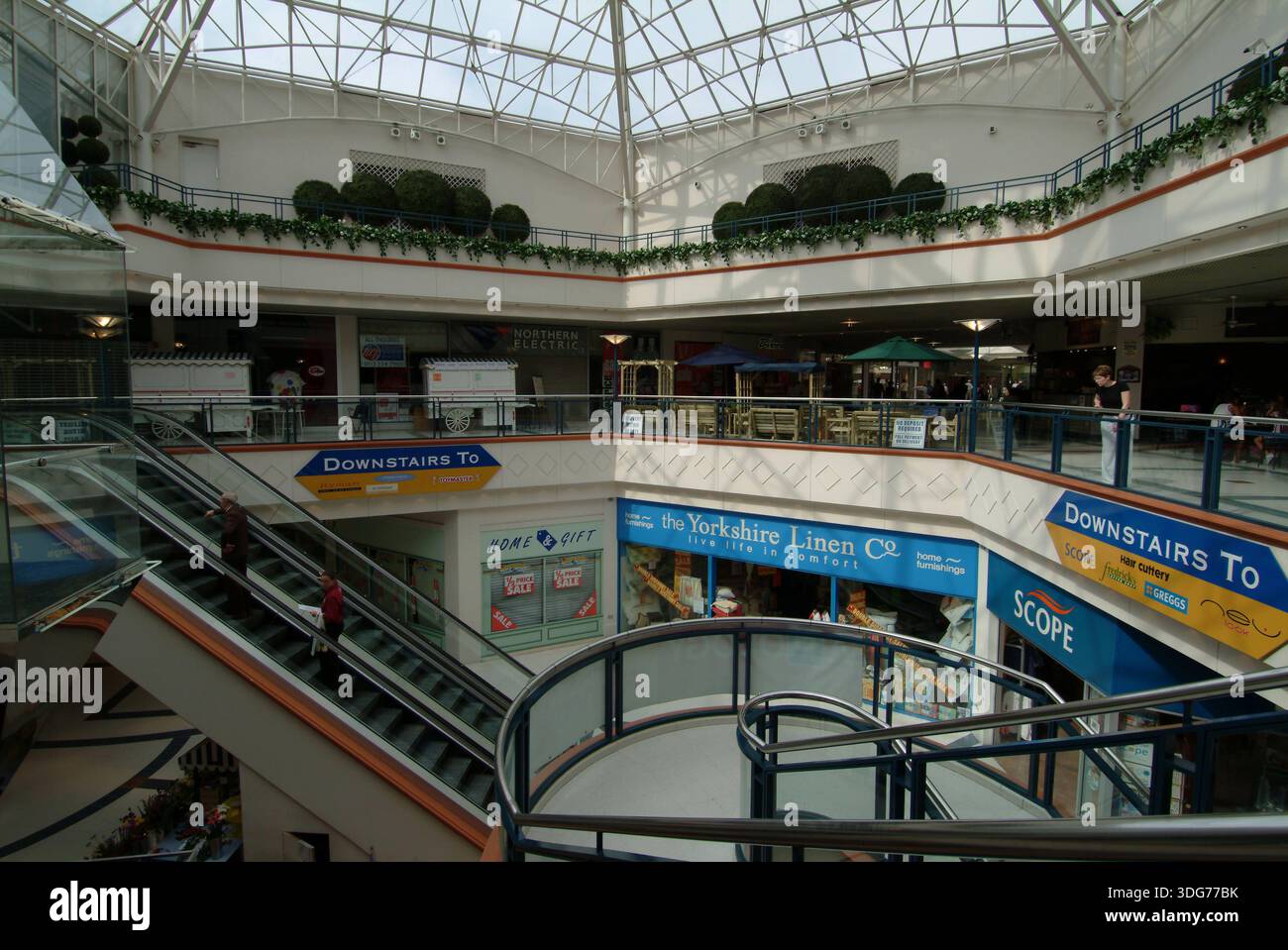 A contemporary shopping centre showcasing modern architectural design ...