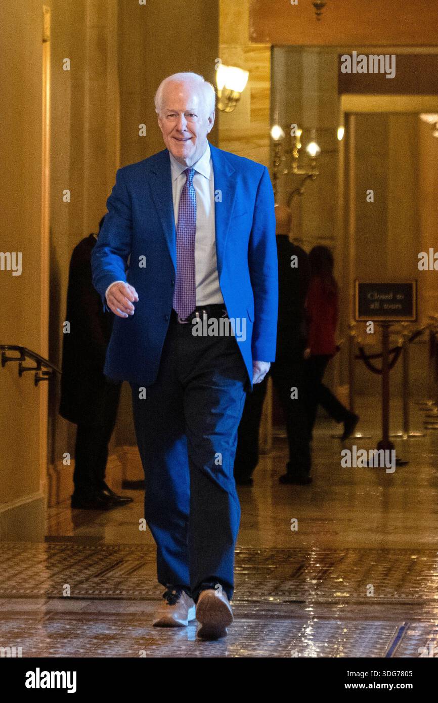 Sen. John Cornyn, R-Texas, walks through the Capitol, Thursday, Jan. 15 ...