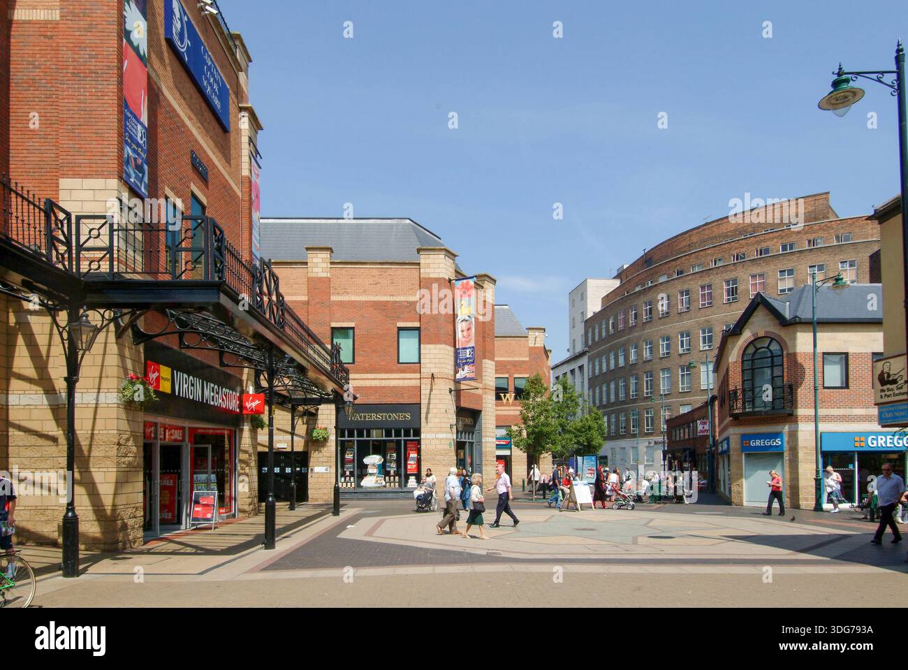 Crowd gathered in Captain Cook Square amidst retail and architectural ...