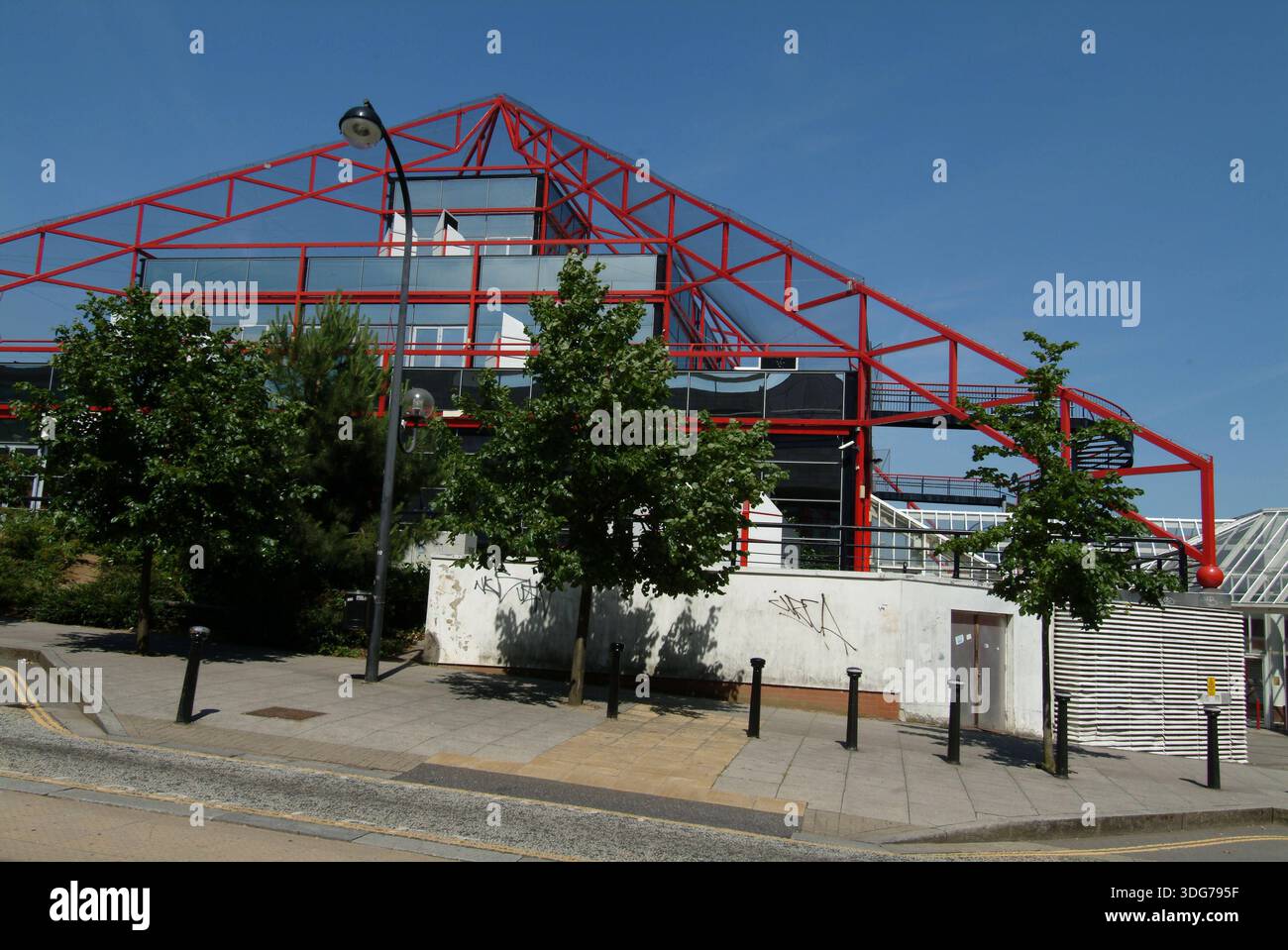 Distinctive pyramid-shaped architecture housing a shopping centre in a ...