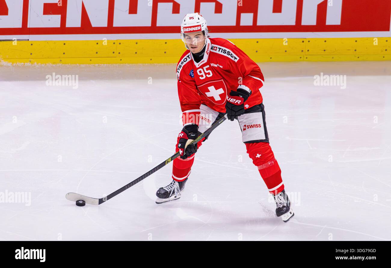 Zurich, Switzerland, 13th Dec 2025: #95 Tyler Moy, forward Switzerland ...