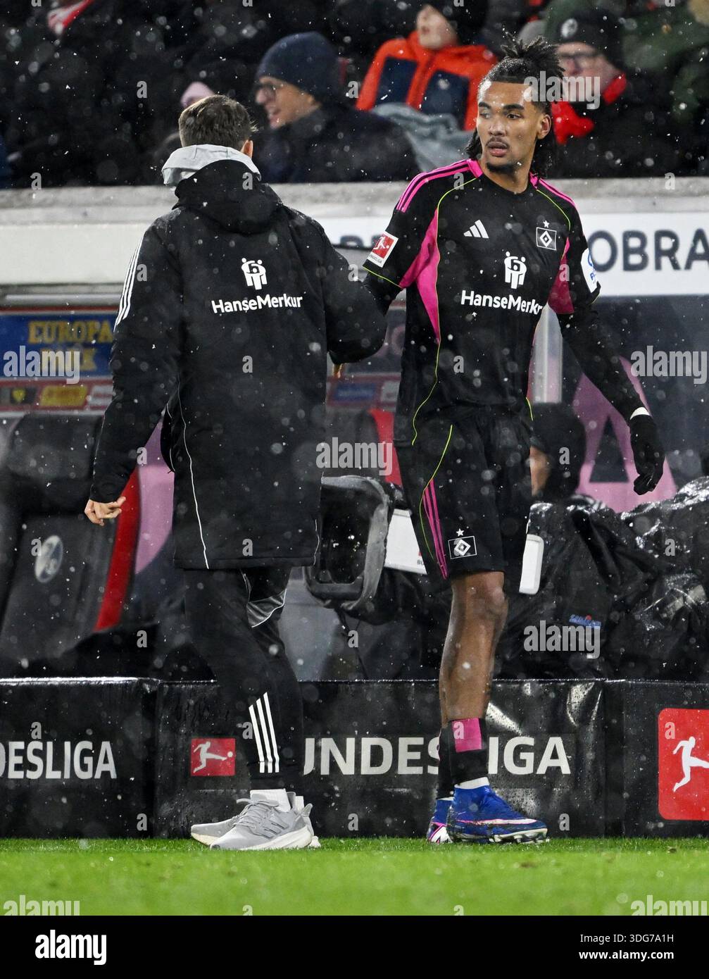 from left Co-Trainer [assistant coach] [coach] Loic Fave, Damion Downs ...