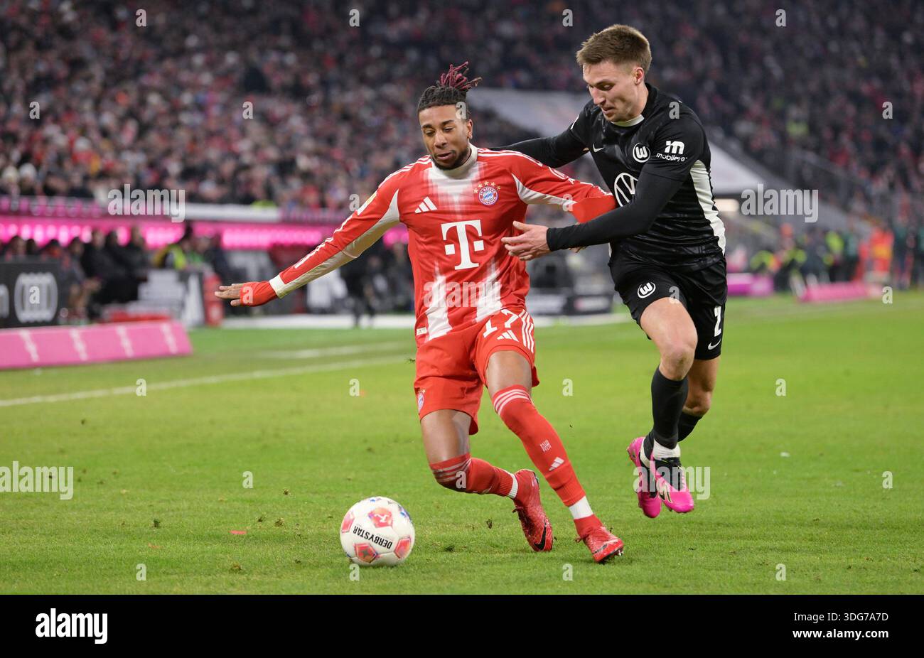 from left: Michael Olise (Bayern), Kilian Fischer Munich, January 11 ...